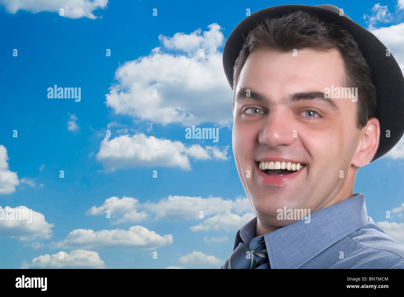 people blue sky - men on hat Stock Photo - Alamy