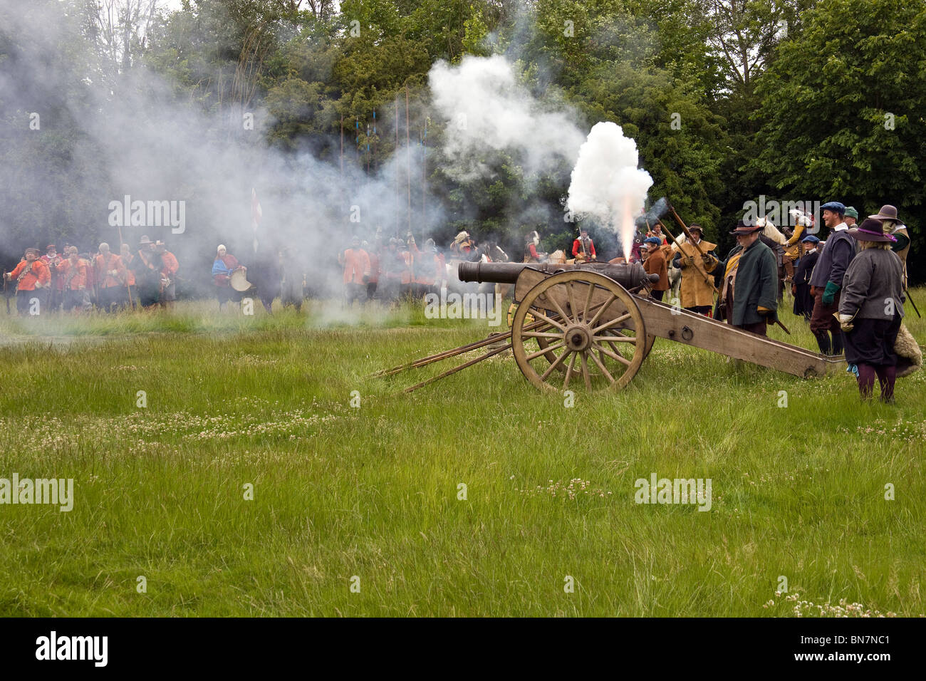 The canon fuse having just been lit the crew stand back waiting for the ...