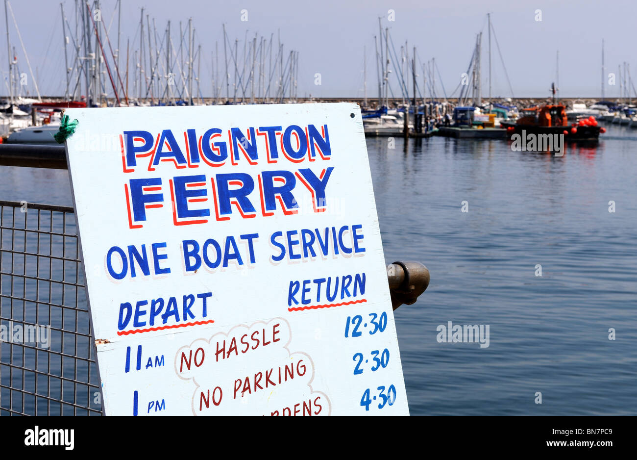 the paignton ferry sign at brixham harbour, devon, uk Stock Photo - Alamy