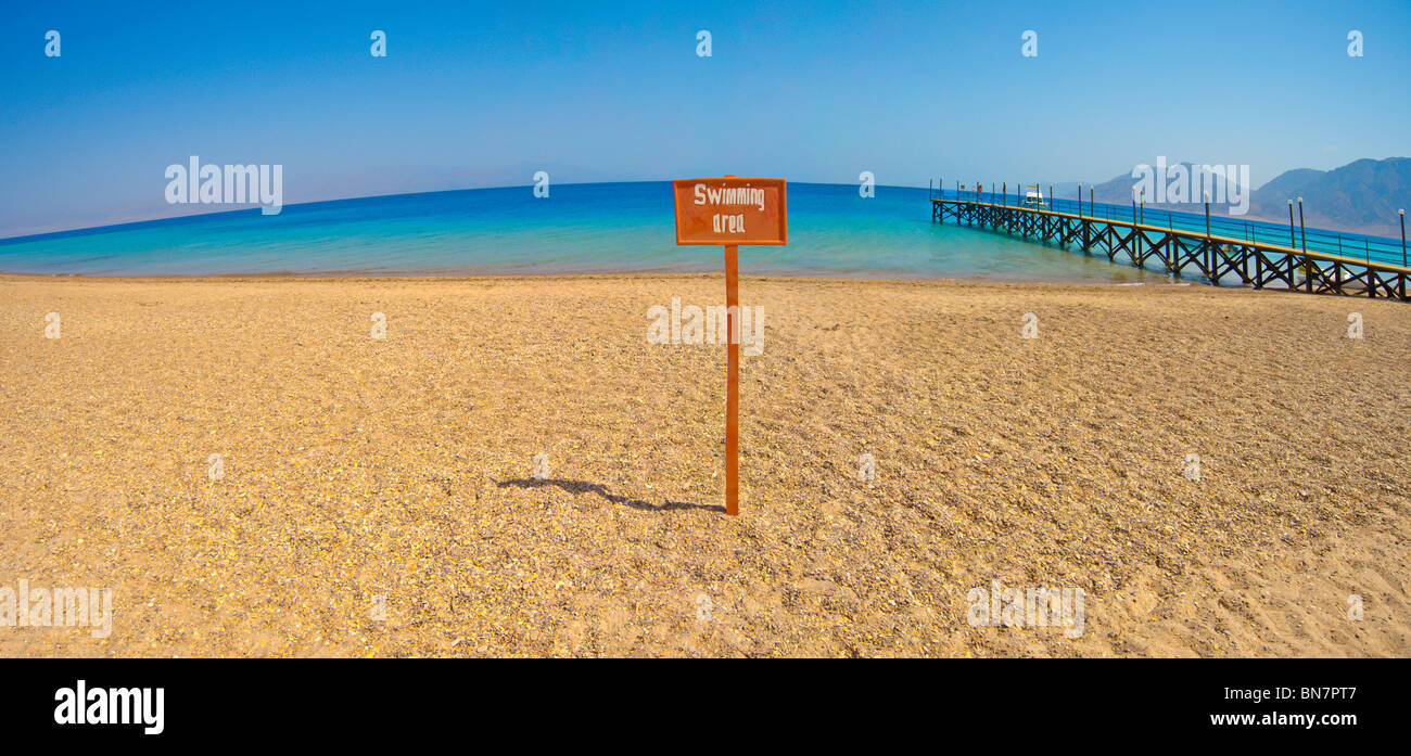 Panoramic view from a tropical beach with swimming area sign Stock ...