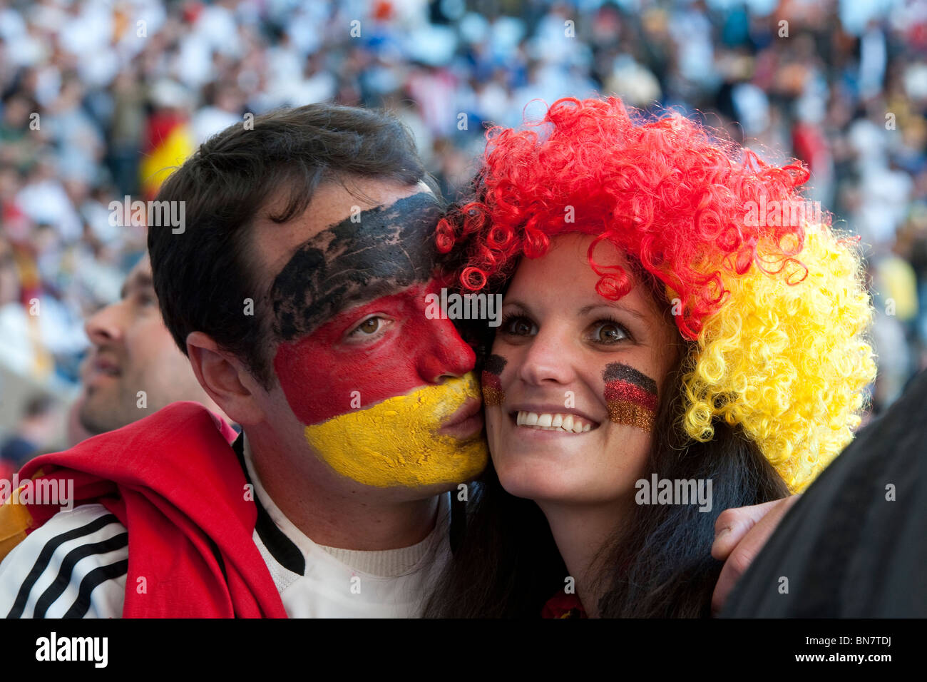German football supporter cpuple with face paint World Cup 2010 Cape ...