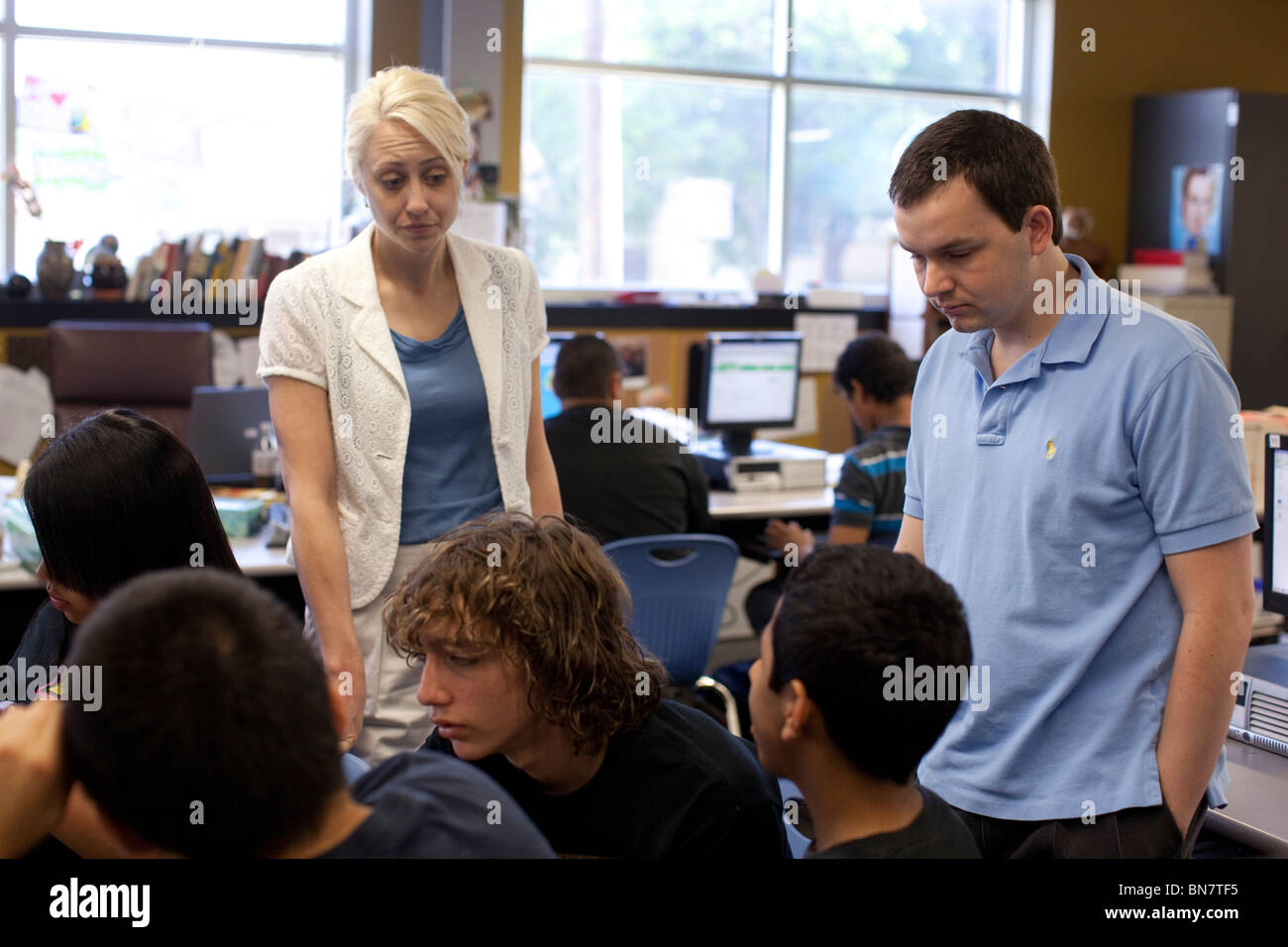 Anglo female and Angle male high school English teachers team-teach in ...