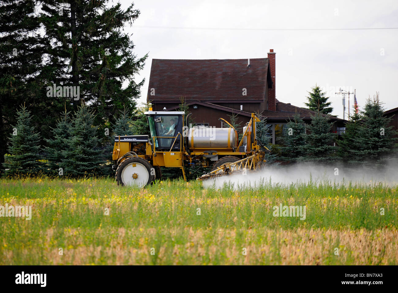 Applying Herbicide to help eliminate problem harvesting soybeans Stock ...