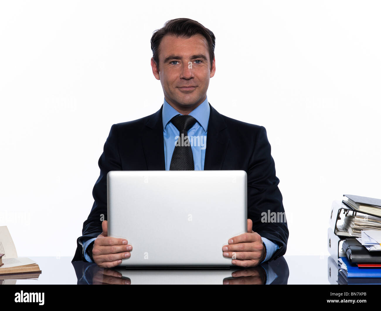one caucasian man businessman holding laptop computer looking at camera ...