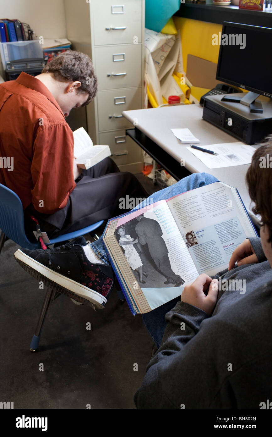 High school boys read in class during mandatory 30-minute reading break ...