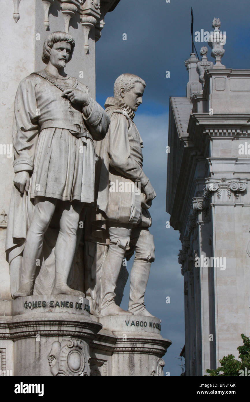 Figures at the base of the statue of Luis de Camoes in Praca Luis de ...
