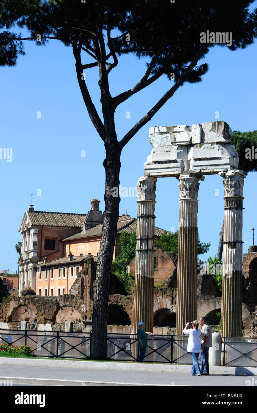 A couple sightseeing on Via dei Fori Imperial in Rome, Italy Stock ...