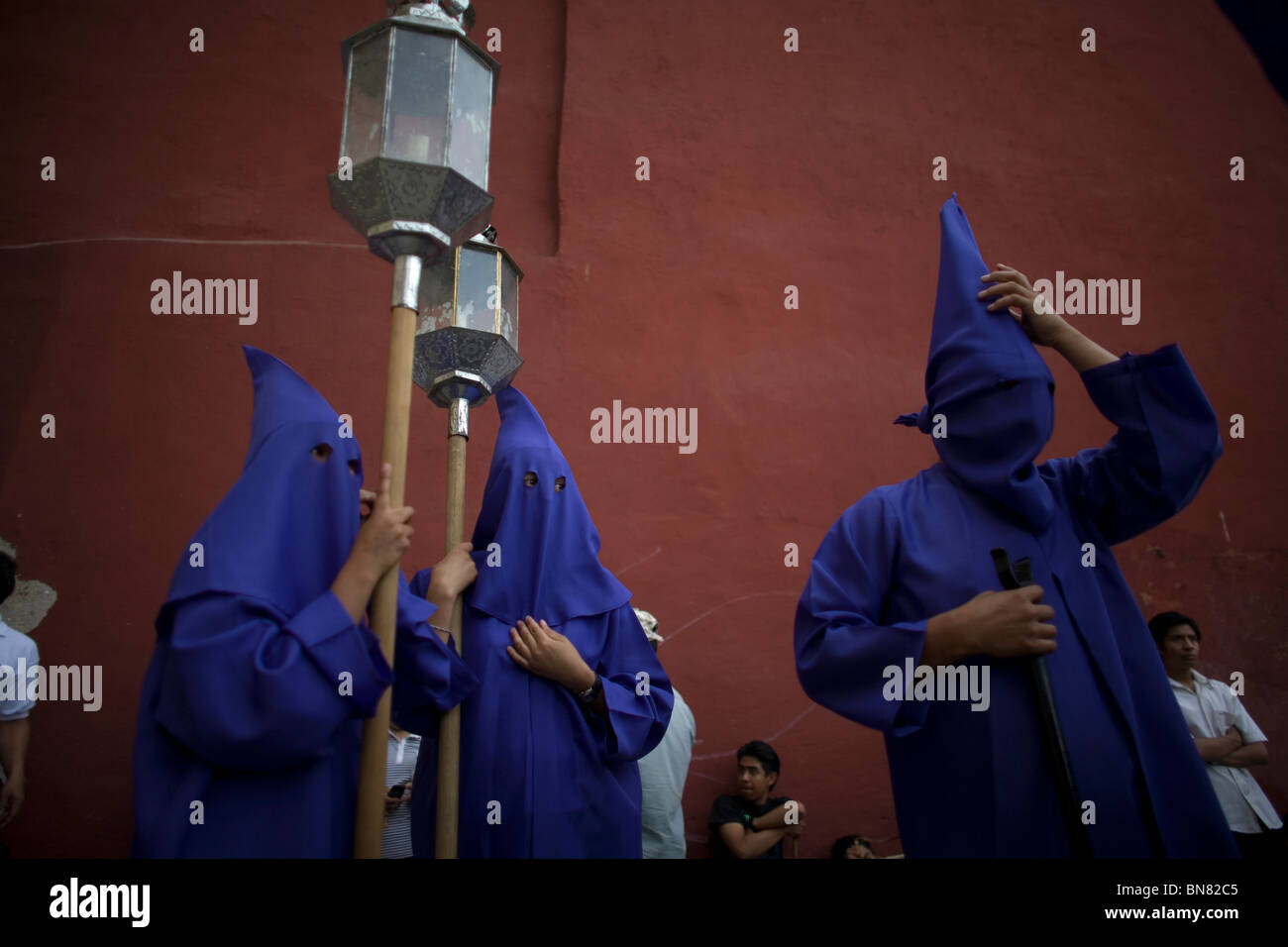 Penitents wearing pointed hats during holy week celebrations in Oaxaca ...