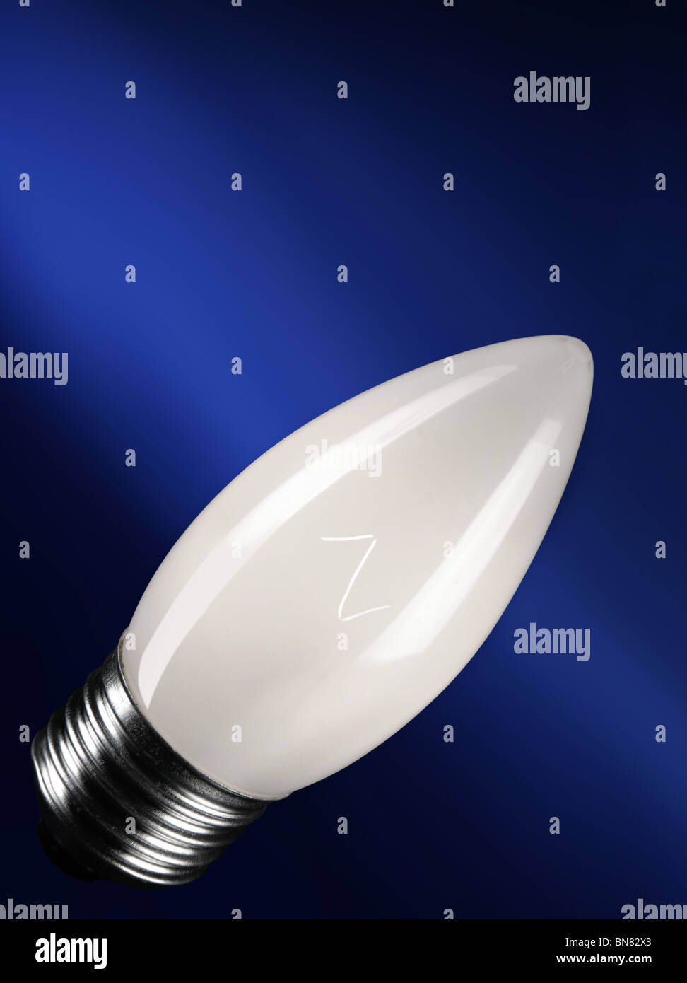 Light bulb lighting equipment on blue background Stock Photo - Alamy