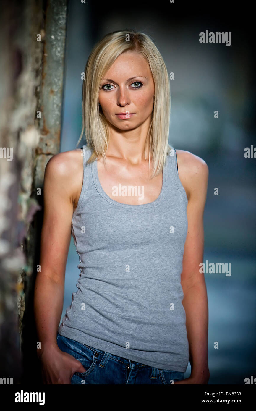 Sexy woman poses in a degraded area Stock Photo - Alamy