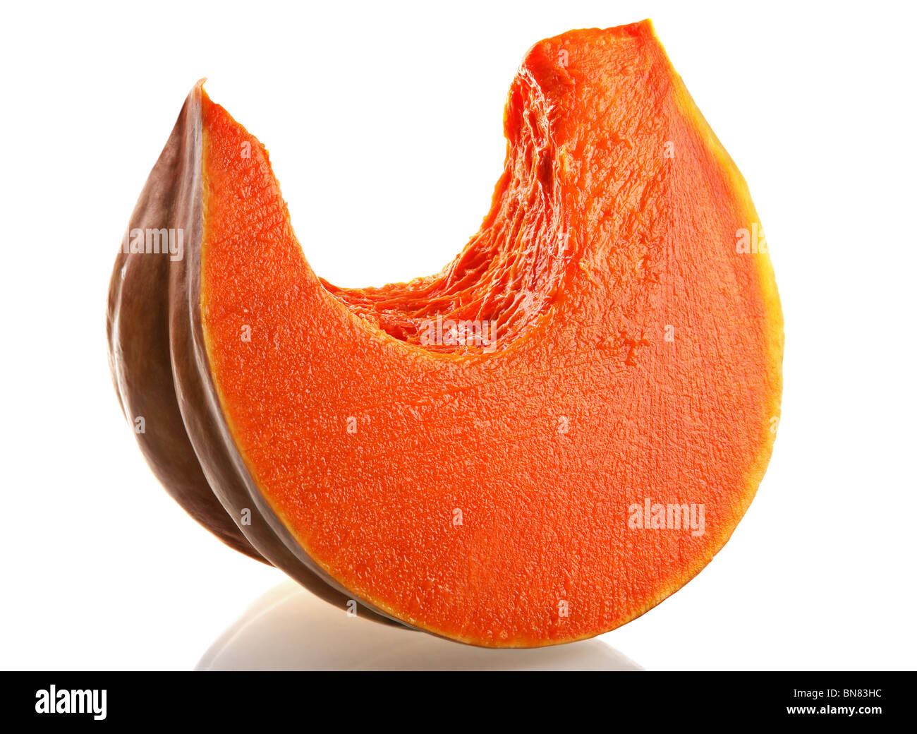 Pumpkin slice vegetable on white Stock Photo - Alamy