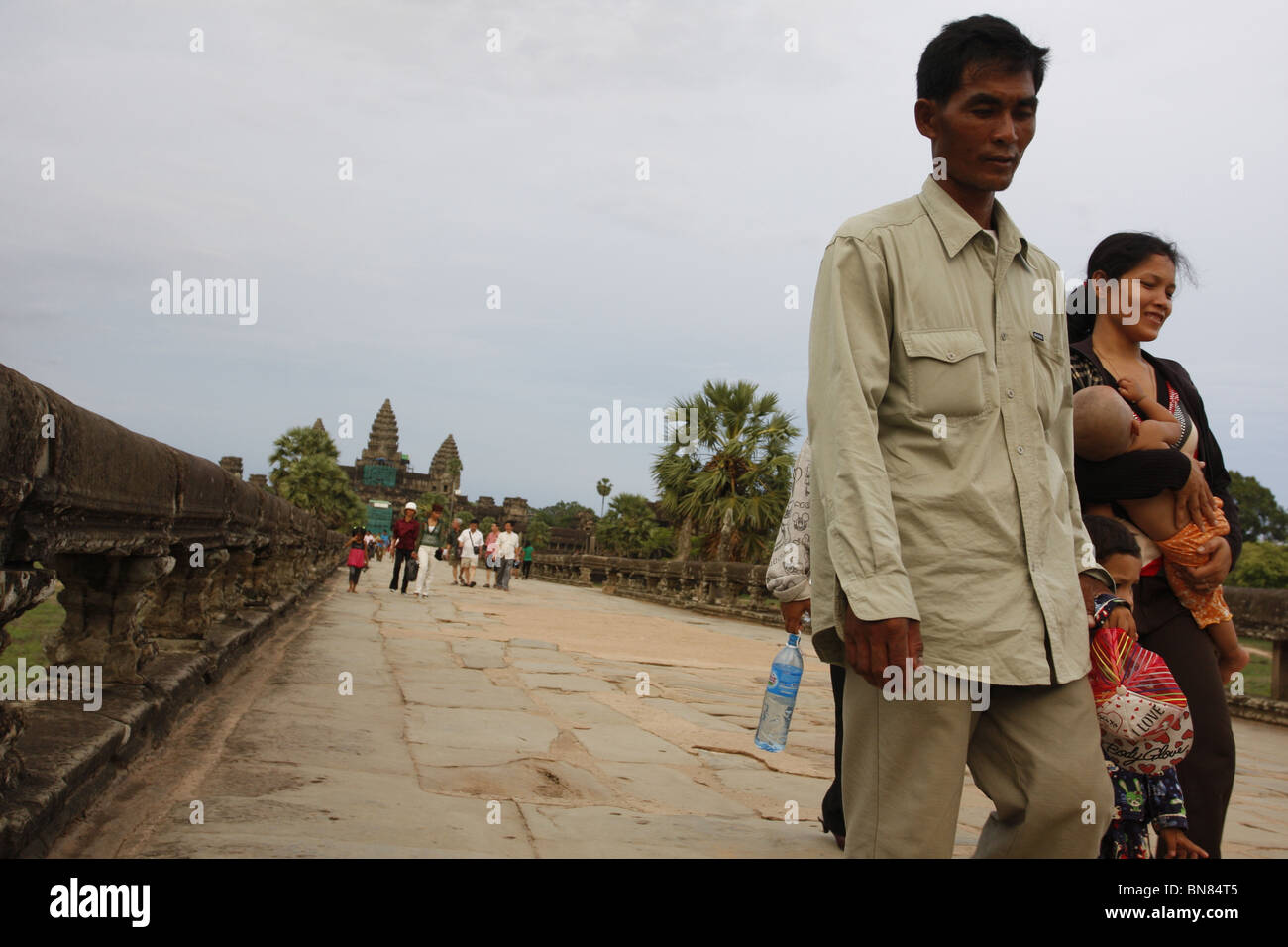 Cambodian visitors on the causeway to Angkor Wat Stock Photo - Alamy