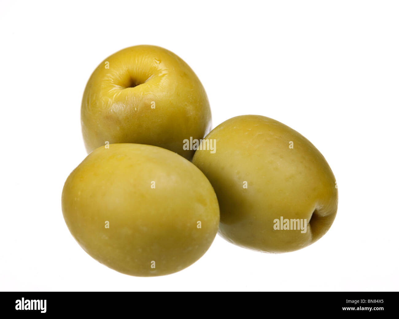 Green olive vegetable closeup on white Stock Photo - Alamy