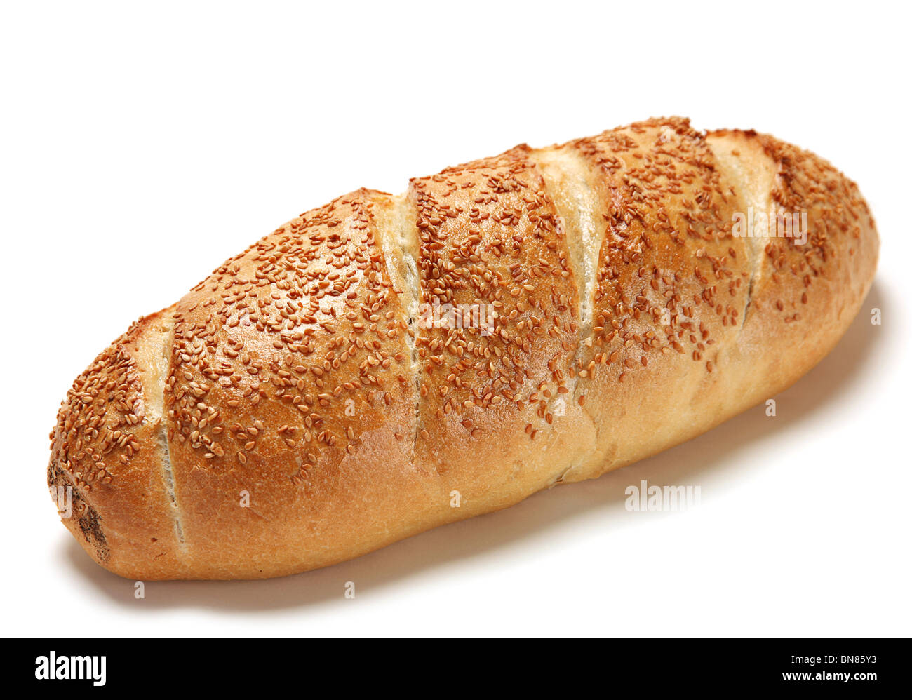White bread loaf with sesame on white Stock Photo - Alamy