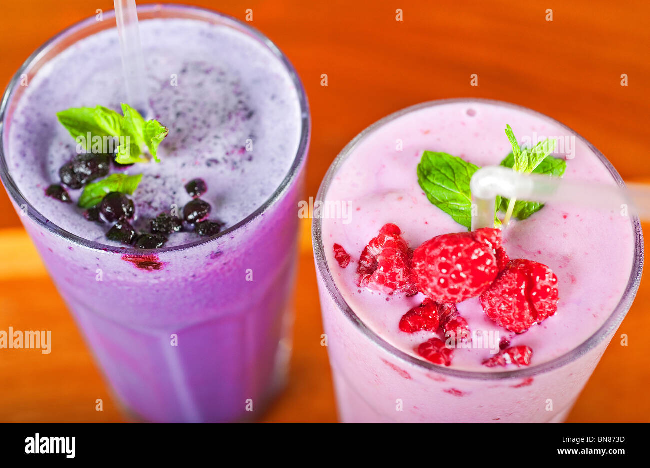 Blueberry and a raspberry fresh fruit fruit smoothie Stock Photo - Alamy