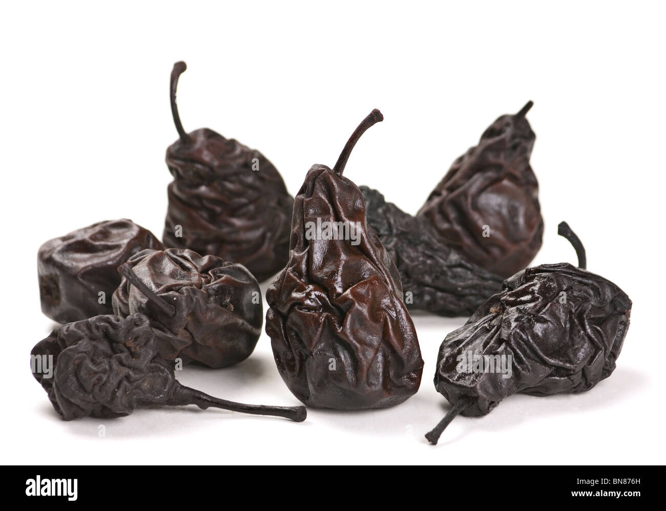 Smoked dried pear vegetable on white background Stock Photo - Alamy