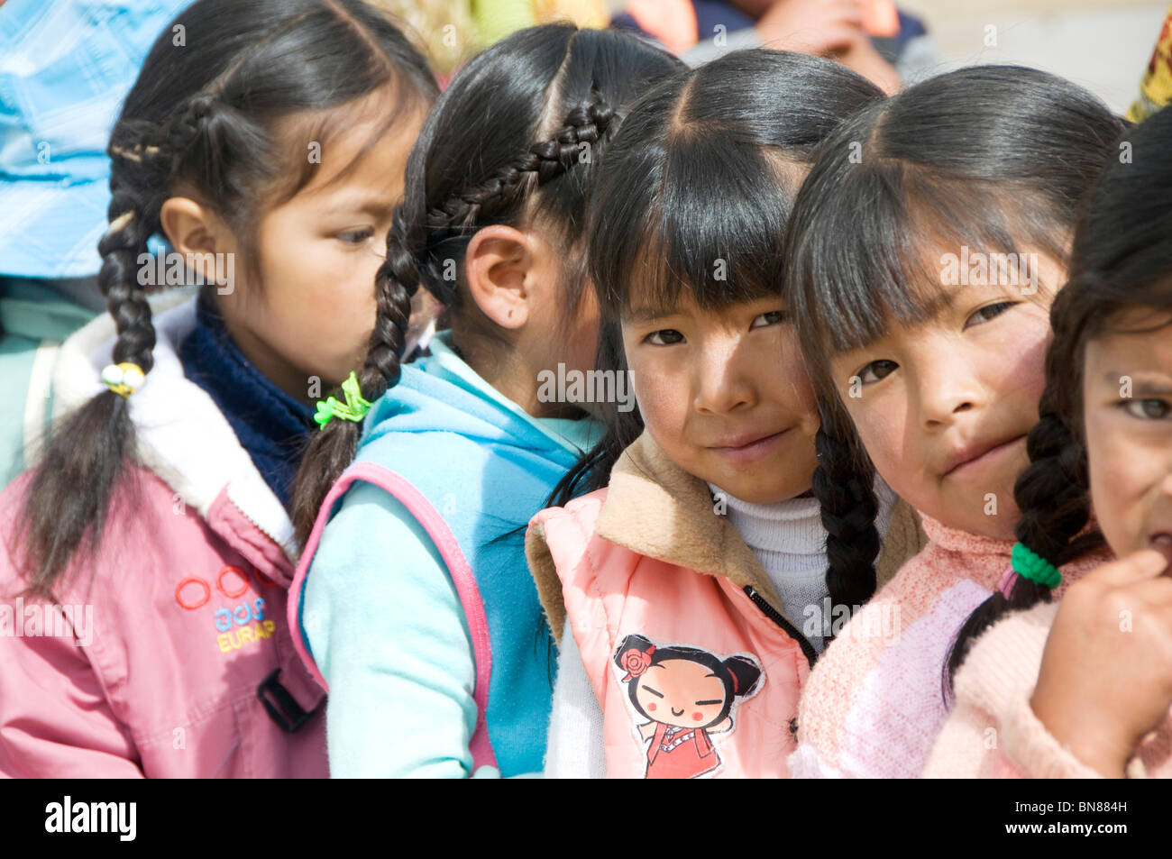 El Alto.Line of primary school girls at open air assembly Stock Photo ...