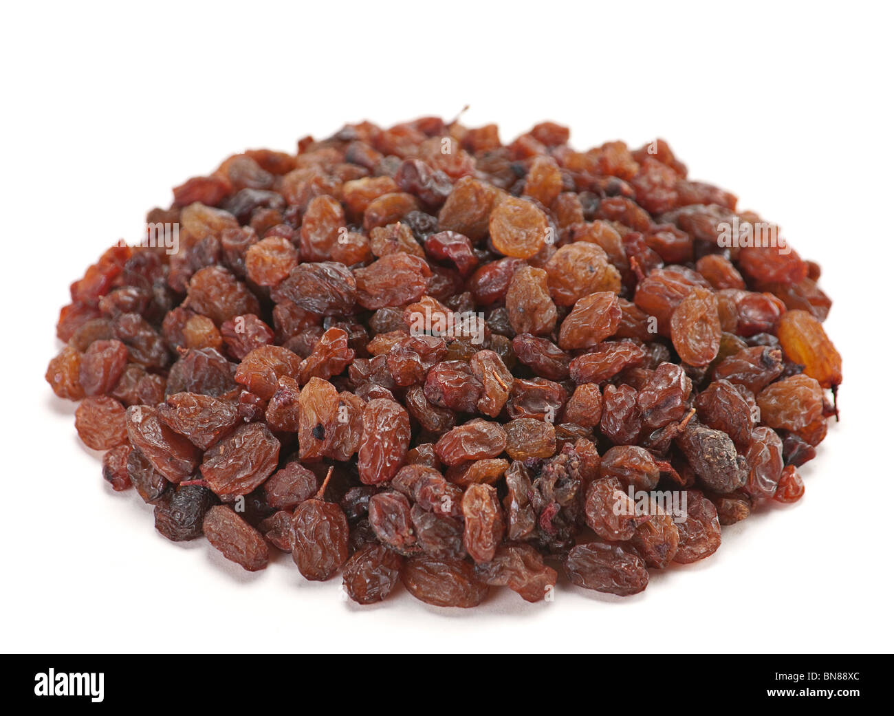 Brown raisin dried fruit isolated on white Stock Photo - Alamy