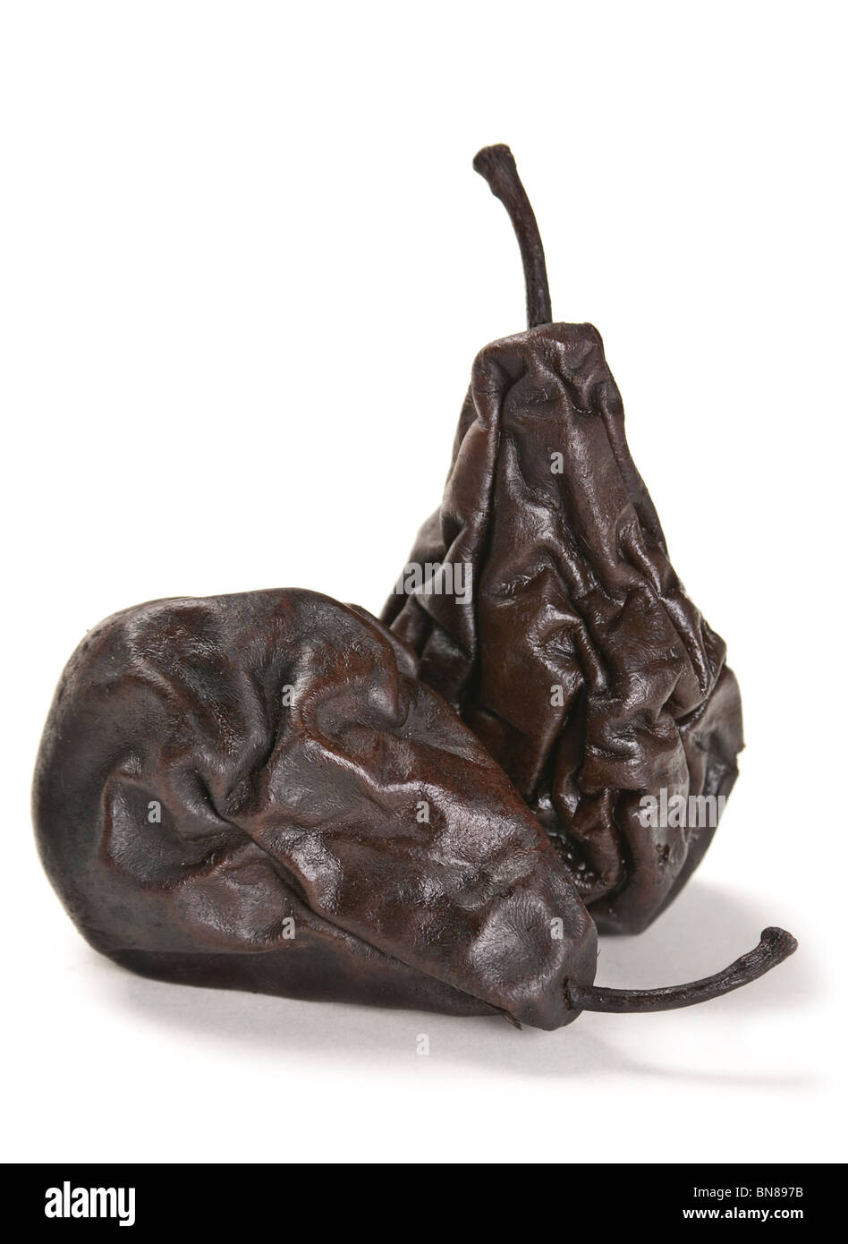 Smoked dried pear vegetable on white background Stock Photo - Alamy