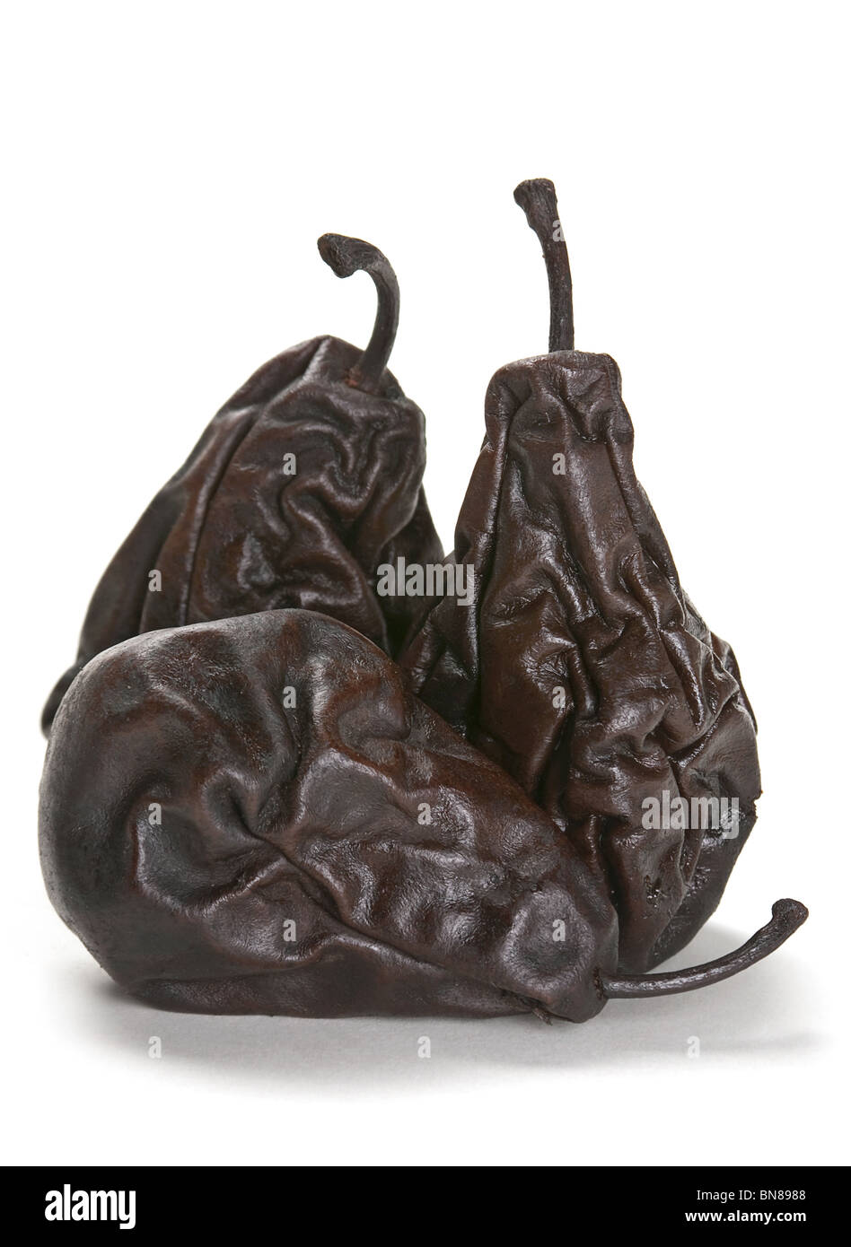 Smoked dried pear vegetable on white background Stock Photo - Alamy