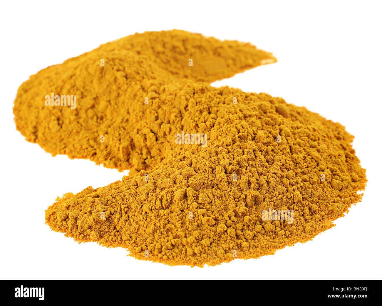 Curcuma yellow spice heap on white Stock Photo - Alamy