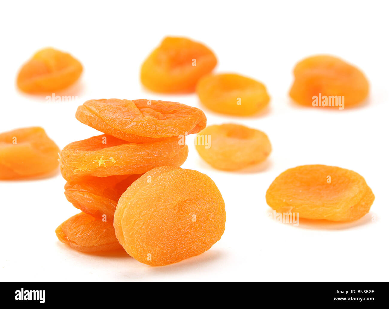 Dried fruit yellow apricot on white background Stock Photo - Alamy