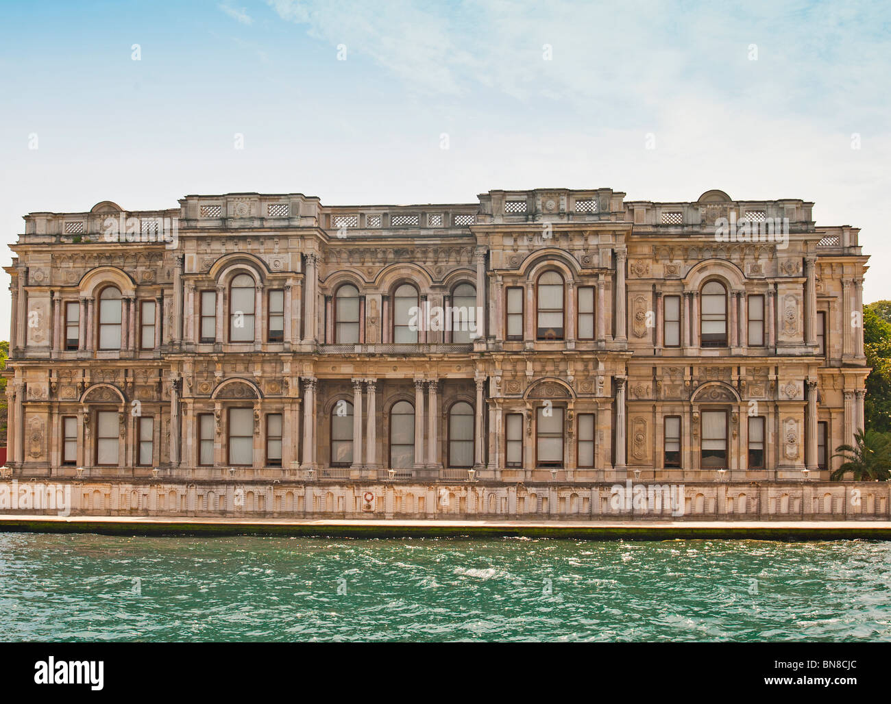 Large palace in Istanbul, Turkey on the edge of the Bosphorus river ...
