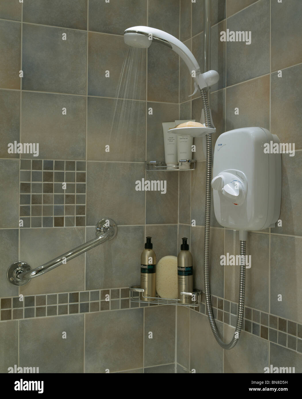 Close-up of shower with water pouring from electric shower head Stock ...