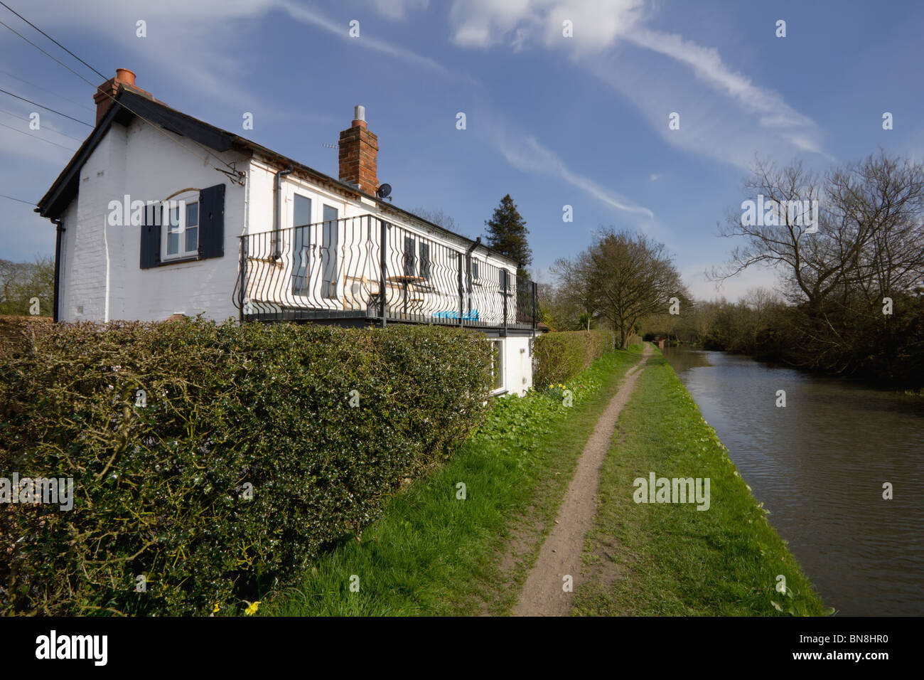 Houses next to canal or river Stock Photo - Alamy