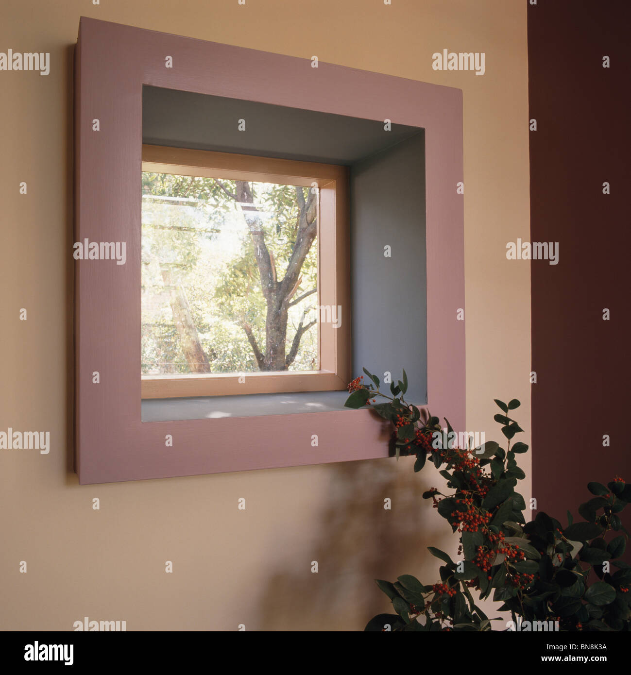 Close-up of alcove window with pink frame Stock Photo - Alamy