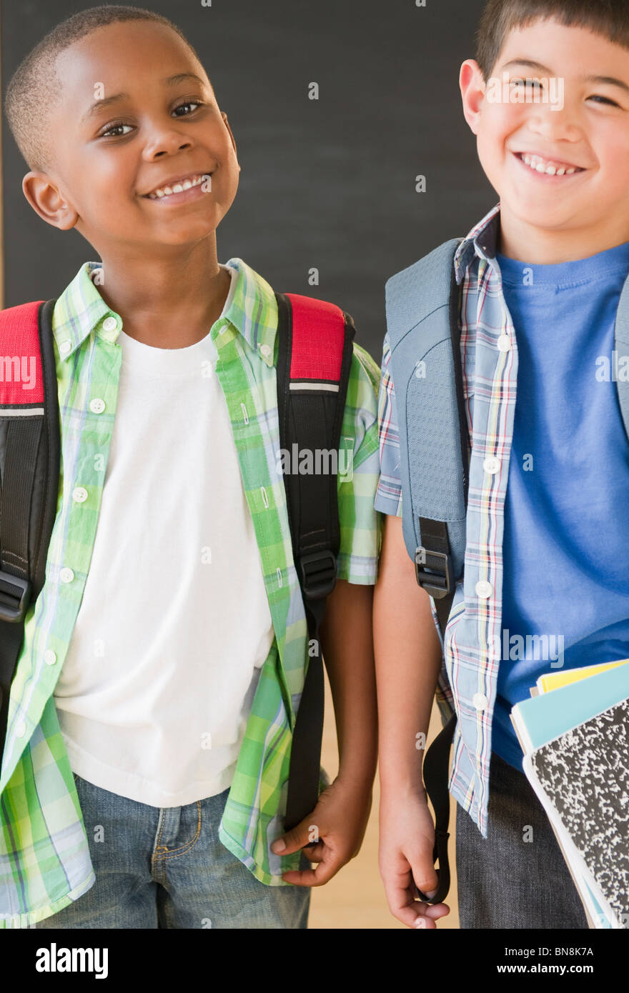 Boys with backpacks hi-res stock photography and images - Alamy