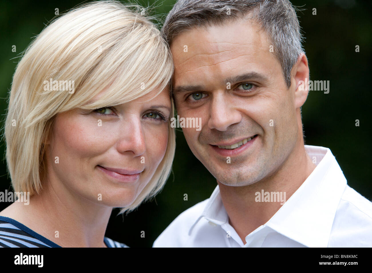 Couple smiling headshot Stock Photo - Alamy