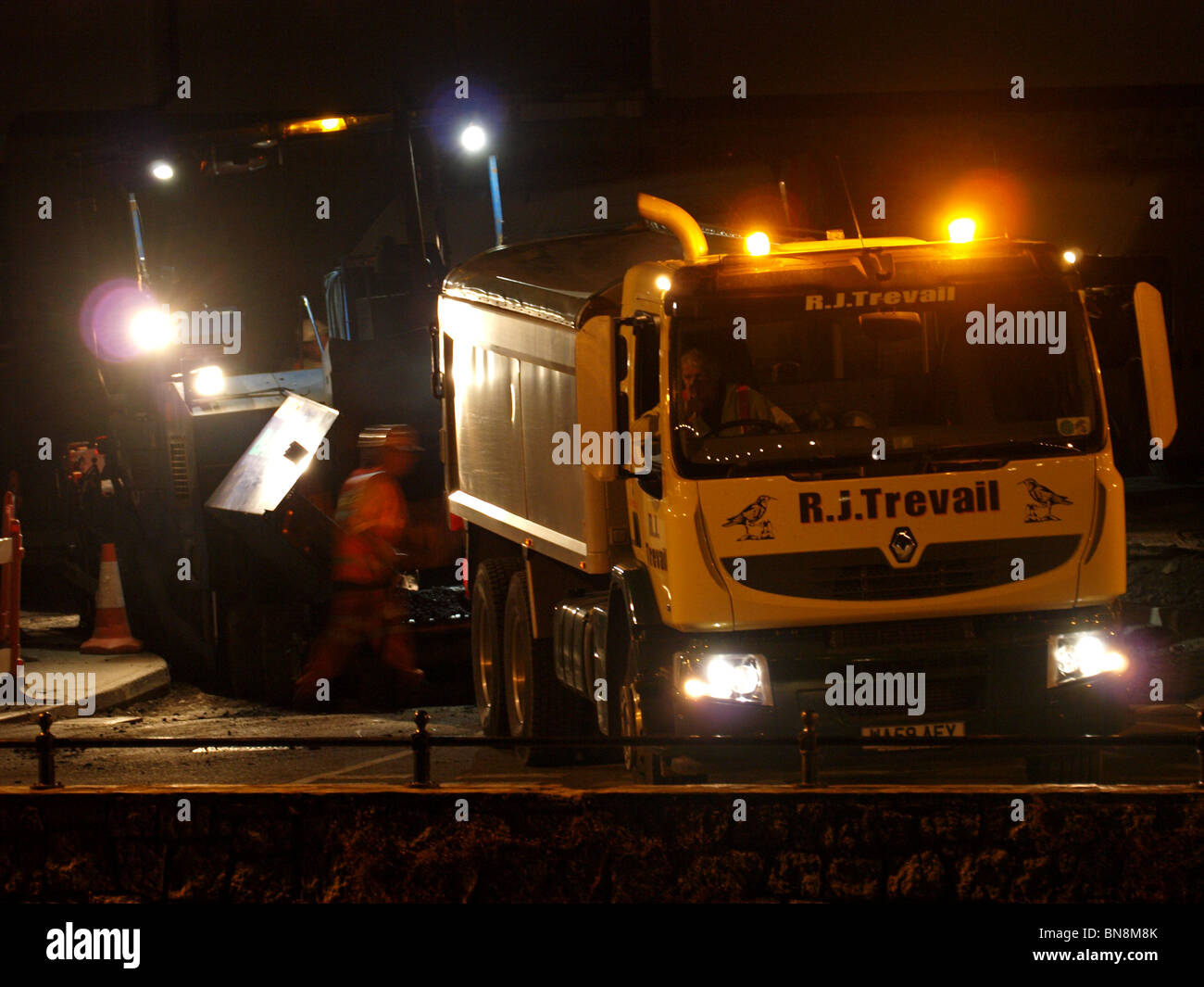 Road workers working at night, Bude, Cornwall, UK Stock Photo - Alamy