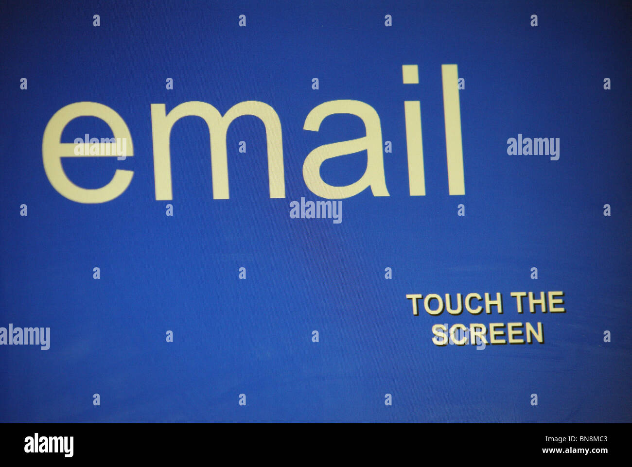 The word email on a blue screen Stock Photo - Alamy