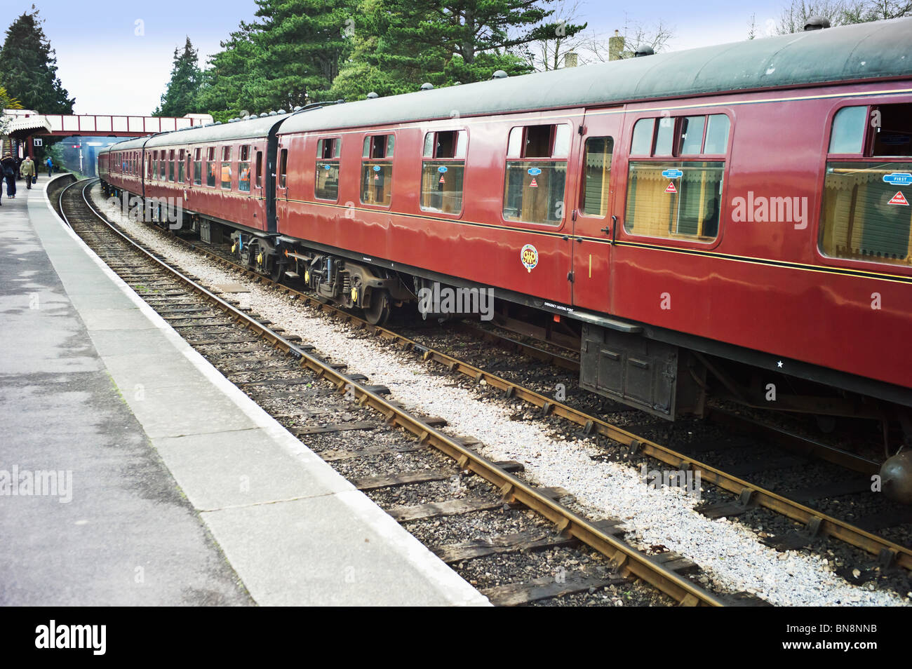 A station on a railway line in the countryside Stock Photo - Alamy