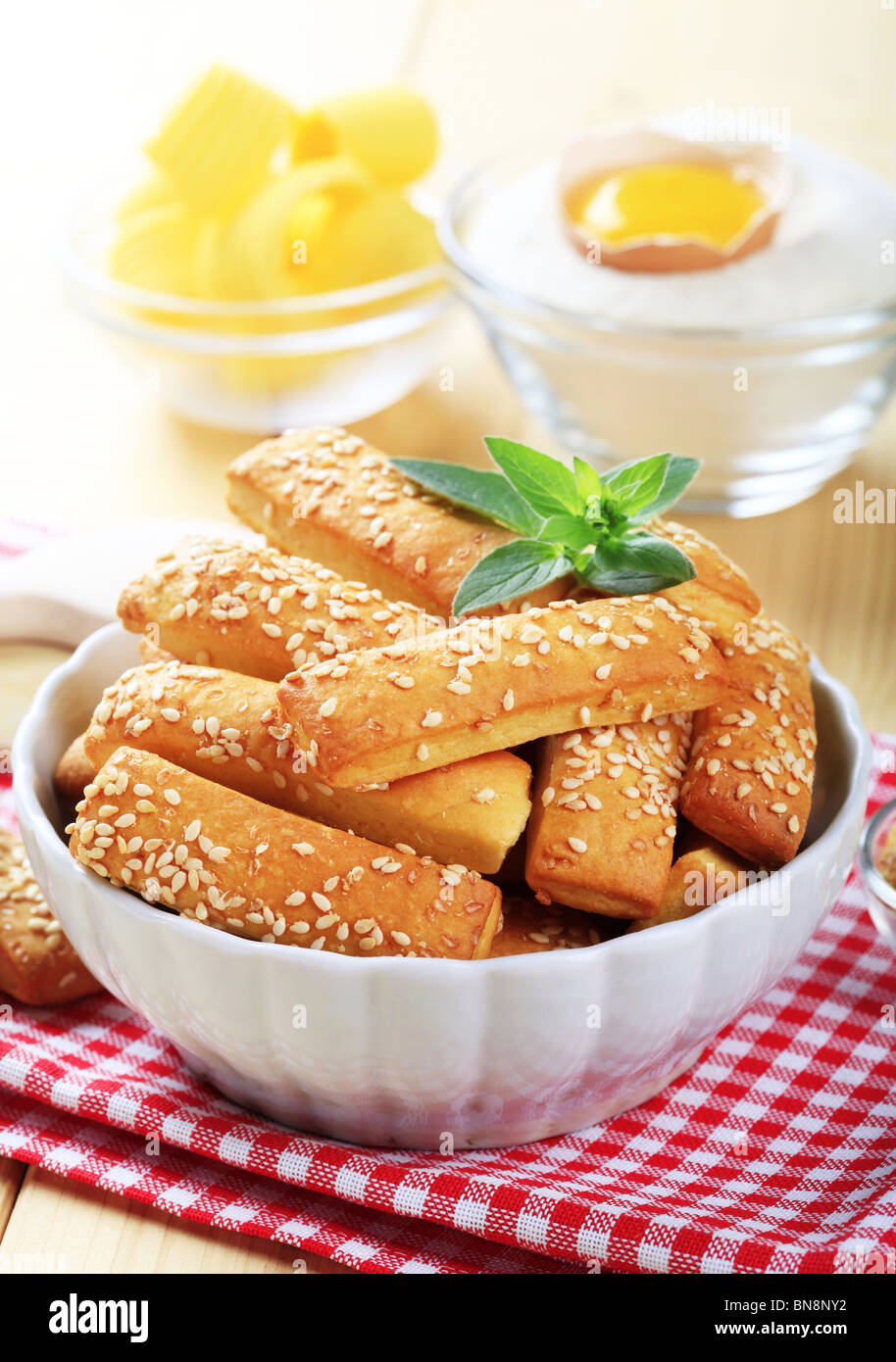 Crispy snacks with sesame seeds on top Stock Photo - Alamy