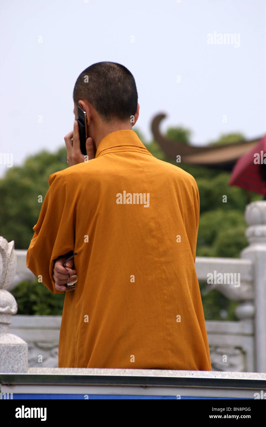 Buddhist monk phone hi-res stock photography and images - Alamy