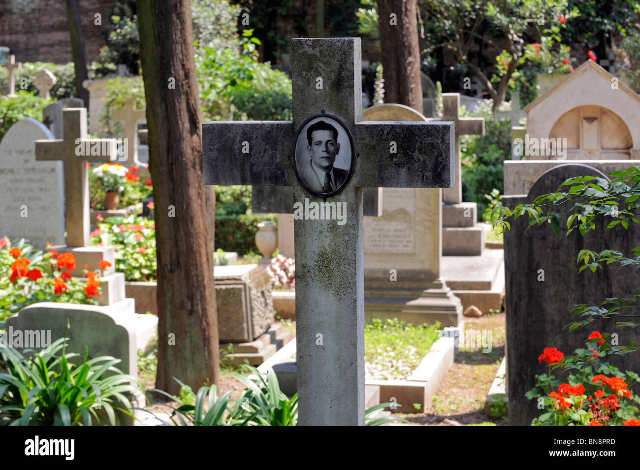 A grave in the English Cemetery displaying a photograph of the deceased ...