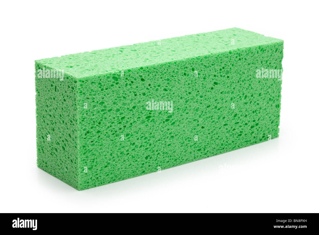 Green Sponge with white background Stock Photo - Alamy