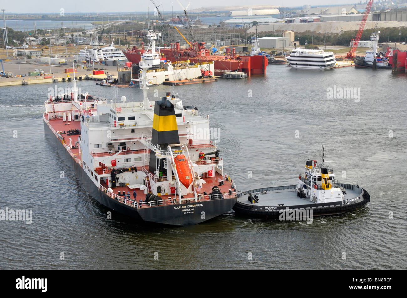 Tugboat moving barge in Tampa Bay Florida waterway harbor channel Stock ...