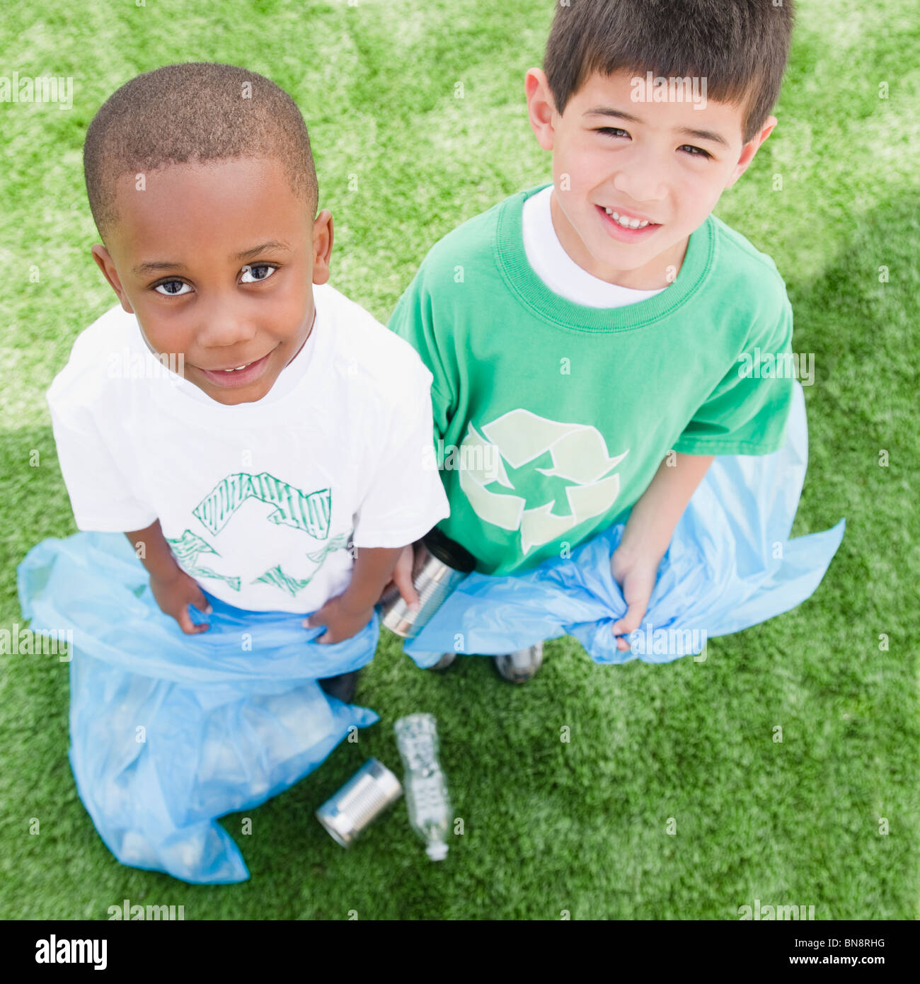 Boy holding trash bag hi-res stock photography and images - Alamy