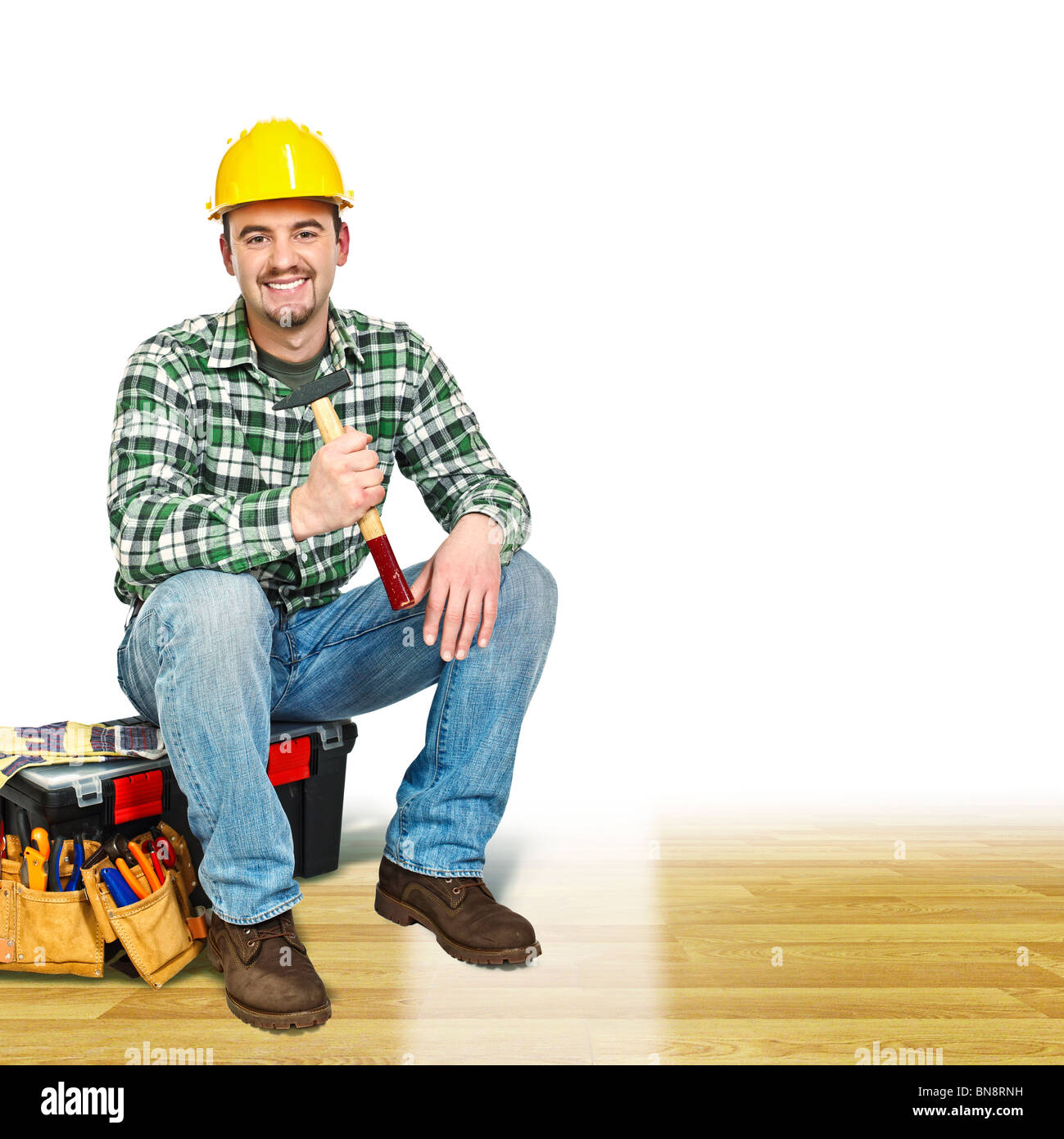 young man tools on wood floor Stock Photo - Alamy