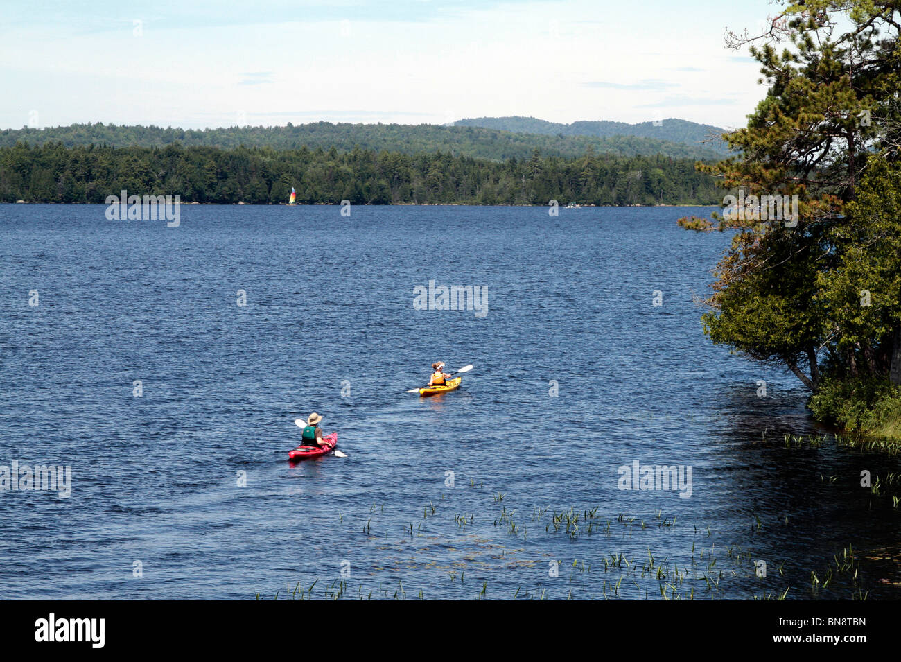 Kayaking on Raquette Lake Adirondack State Park Stock Photo - Alamy