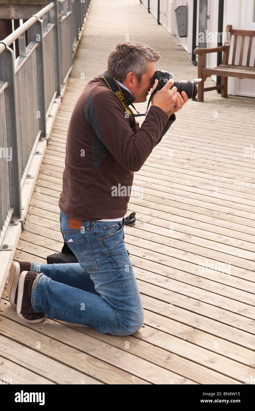A photographer at work in the Uk Stock Photo - Alamy