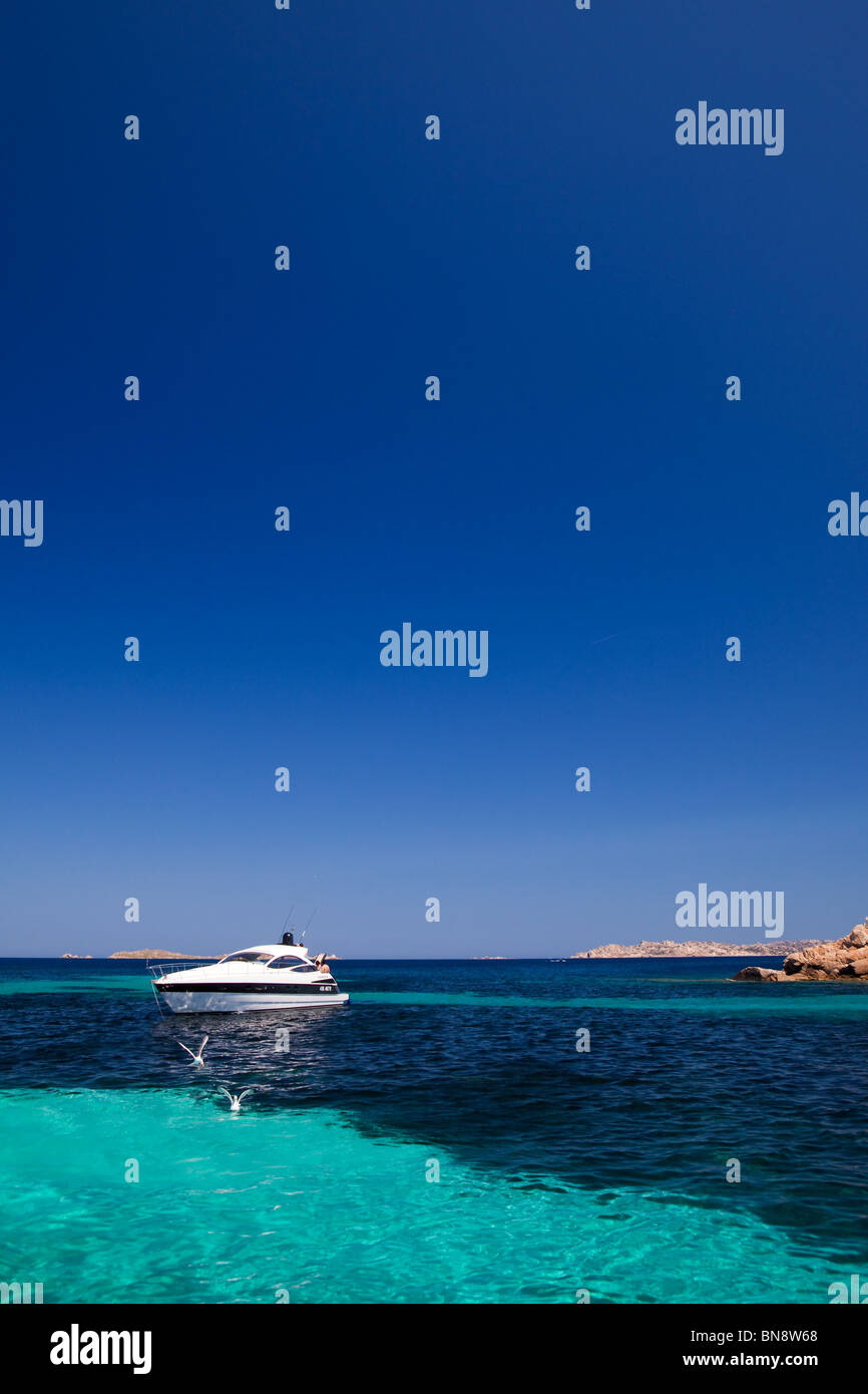 A boat off Budelli Island, part of the La Maddalena Archipelago in ...