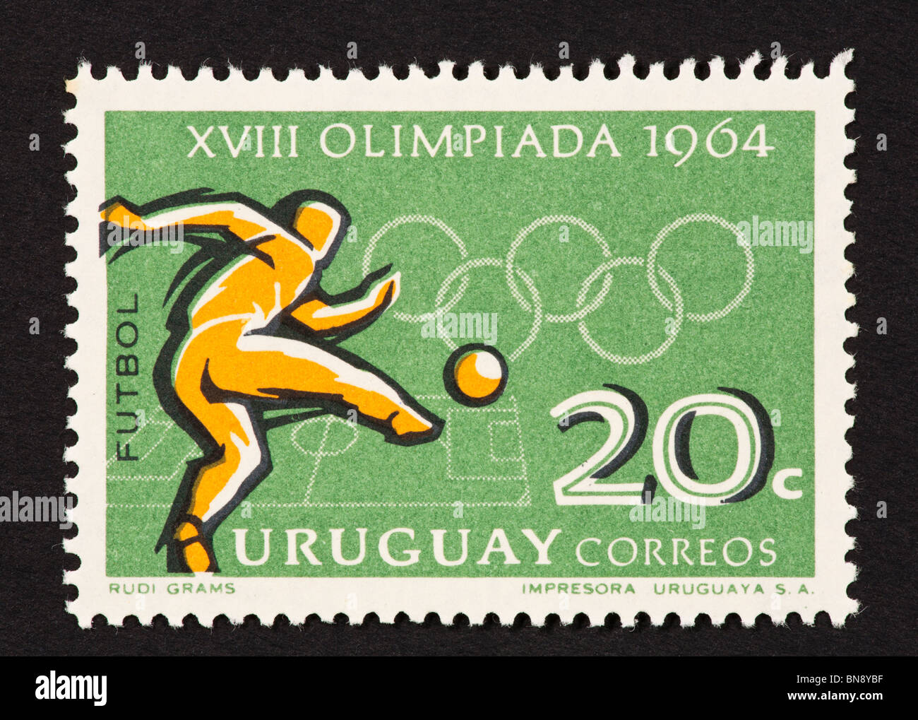 Postage stamp from Uruguay depicting a football (soccer) player, field ...