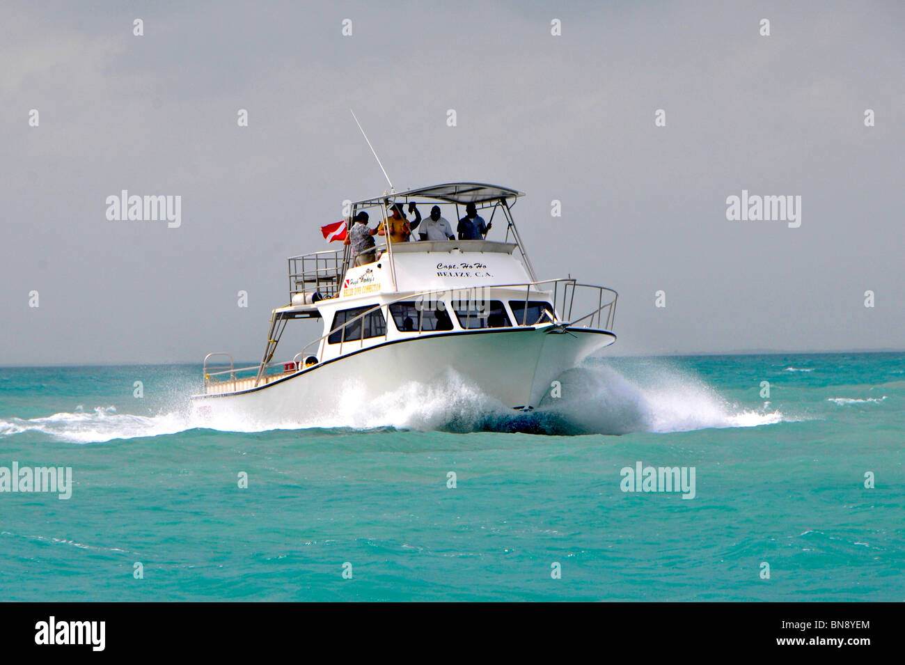 Fishing boat near Caribbean Cruise ship in Belize City Belize Central ...