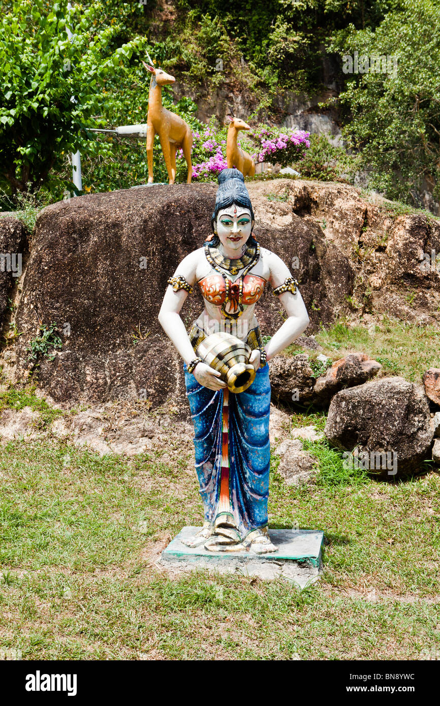 A Hindu religious statue in the grounds of a temple on Penang island ...