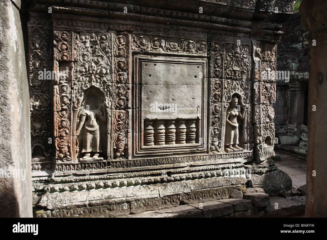 Sculptures of devata, female deities, in a temple wall at Preah Khan ...