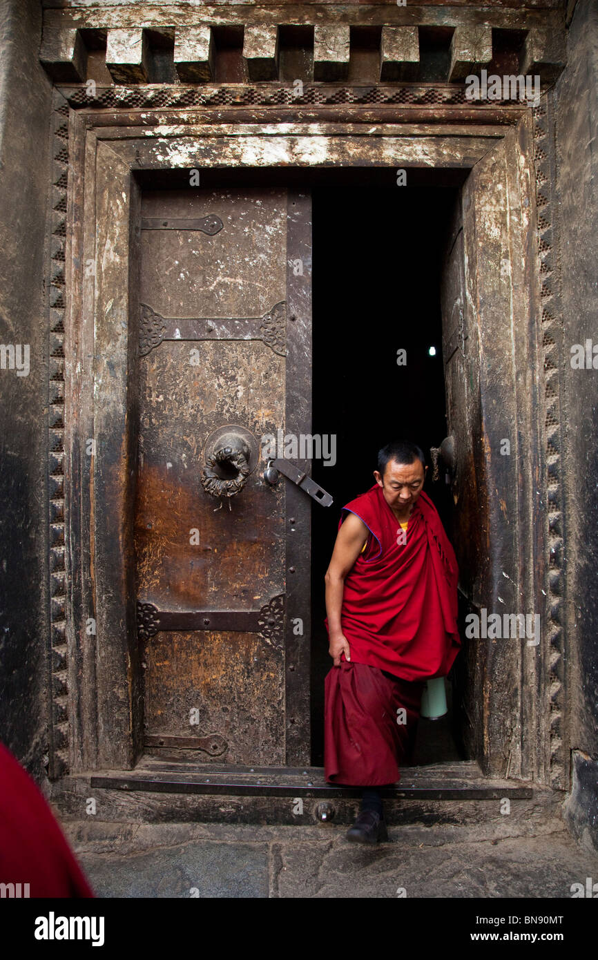 Monk in a doorway at Sera Monastery in Lhasa, Tibet Stock Photo - Alamy